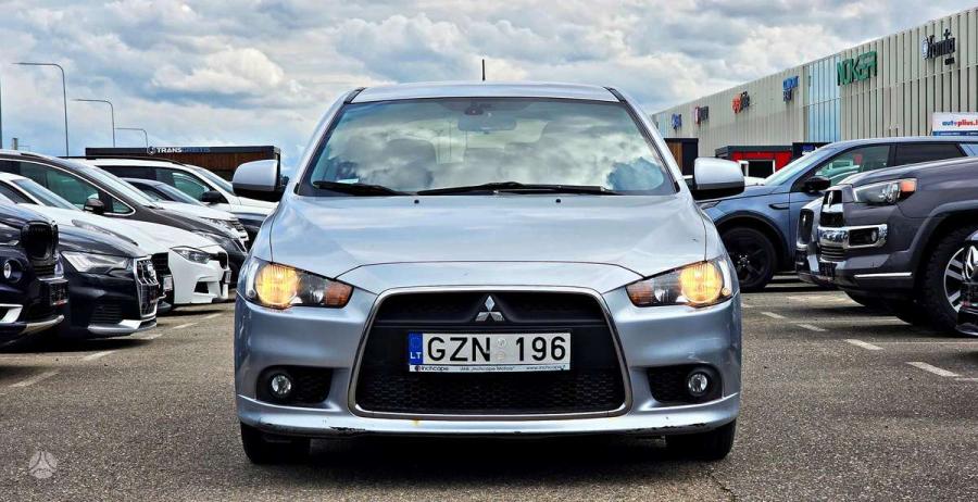 Pelēks Mitsubishi Lancer 2014 Viļņa, ar dzinēja tilpumu 1.59 L un nobraukumu 128 tūkst. km par 4950 €, foto 4 vietnē AUTOMOTO.COM.LV