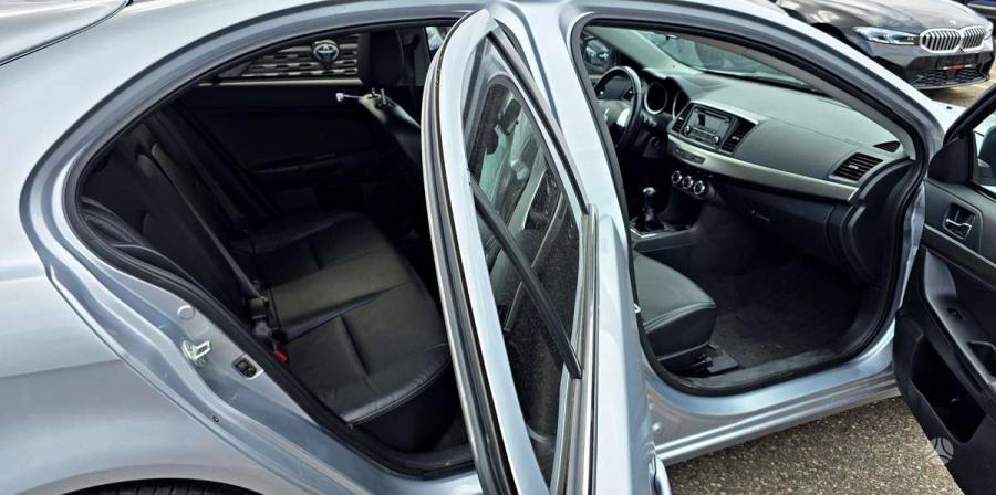 Pelēks Mitsubishi Lancer 2014 Viļņa, ar dzinēja tilpumu 1.59 L un nobraukumu 128 tūkst. km par 4950 €, foto 12 vietnē AUTOMOTO.COM.LV