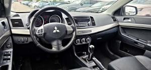 Pelēks Mitsubishi Lancer 2014 Viļņa, ar dzinēja tilpumu 1.59 L un nobraukumu 128 tūkst. km par 4950 €, foto 15 vietnē AUTOMOTO.COM.LV