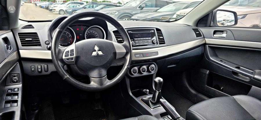 Pelēks Mitsubishi Lancer 2014 Viļņa, ar dzinēja tilpumu 1.59 L un nobraukumu 128 tūkst. km par 4950 €, foto 15 vietnē AUTOMOTO.COM.LV