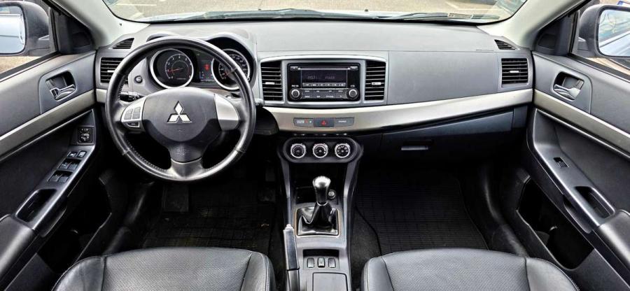 Pelēks Mitsubishi Lancer 2014 Viļņa, ar dzinēja tilpumu 1.59 L un nobraukumu 128 tūkst. km par 4950 €, foto 16 vietnē AUTOMOTO.COM.LV
