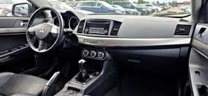 Pelēks Mitsubishi Lancer 2014 Viļņa, ar dzinēja tilpumu 1.59 L un nobraukumu 128 tūkst. km par 4950 €, foto 17 vietnē AUTOMOTO.COM.LV