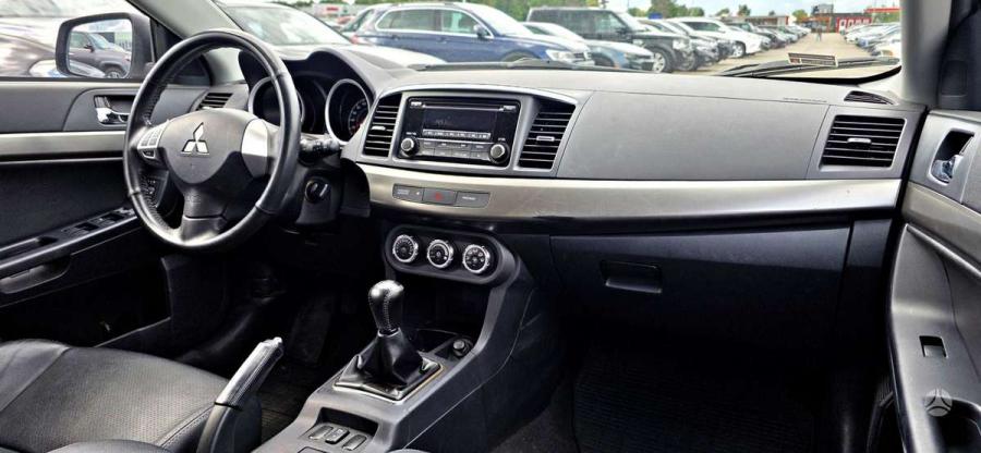 Pelēks Mitsubishi Lancer 2014 Viļņa, ar dzinēja tilpumu 1.59 L un nobraukumu 128 tūkst. km par 4950 €, foto 17 vietnē AUTOMOTO.COM.LV