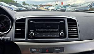 Pelēks Mitsubishi Lancer 2014 Viļņa, ar dzinēja tilpumu 1.59 L un nobraukumu 128 tūkst. km par 4950 €, foto 18 vietnē AUTOMOTO.COM.LV