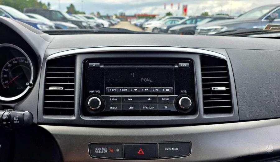 Pelēks Mitsubishi Lancer 2014 Viļņa, ar dzinēja tilpumu 1.59 L un nobraukumu 128 tūkst. km par 4950 €, foto 18 vietnē AUTOMOTO.COM.LV