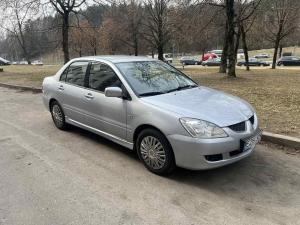 Grey Mitsubishi Lancer 2004 in Vilnius, with an engine capacity of 1.60 L and mileage of 149 thousand km for 850 €, photo  on AUTOMOTO.COM.LV