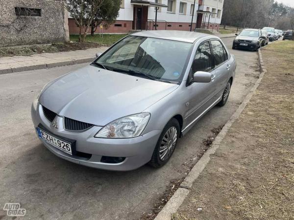 Grey Mitsubishi Lancer 2004 in Vilnius, with an engine capacity of 1.60 L and mileage of 149 thousand km for 850 €, photo 5 on AUTOMOTO.COM.LV