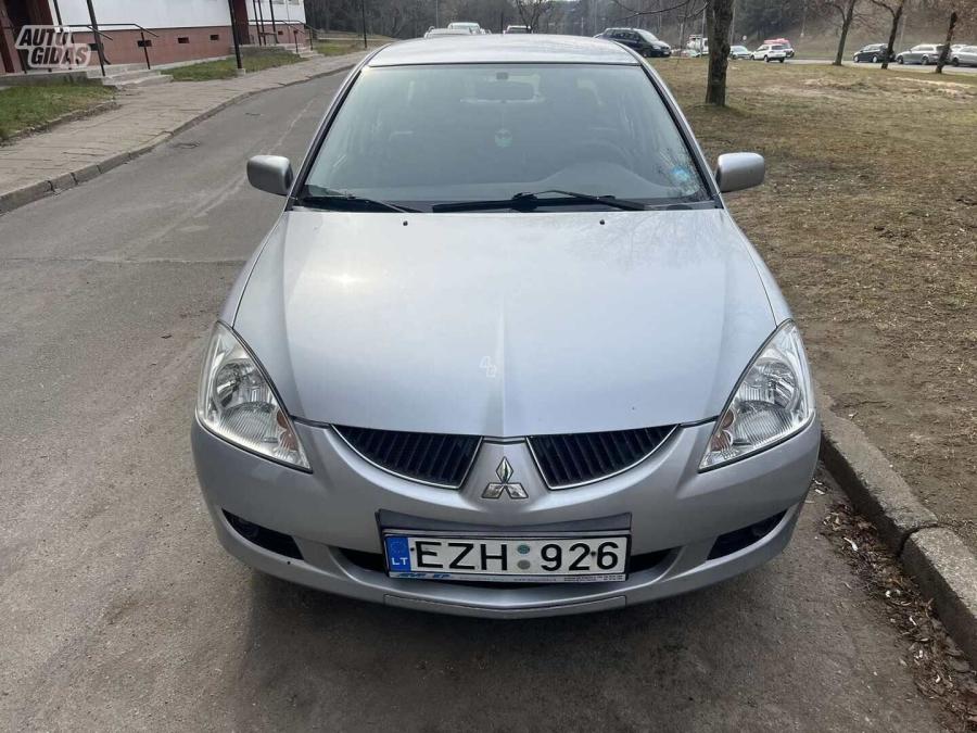 Grey Mitsubishi Lancer 2004 in Vilnius, with an engine capacity of 1.60 L and mileage of 149 thousand km for 850 €, photo 6 on AUTOMOTO.COM.LV
