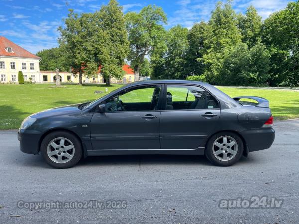 Grey Mitsubishi Lancer 2005 in Saue, with an engine capacity of 1.60 L and mileage of 119 thousand km for 2250 €, photo 5 on AUTOMOTO.COM.LV