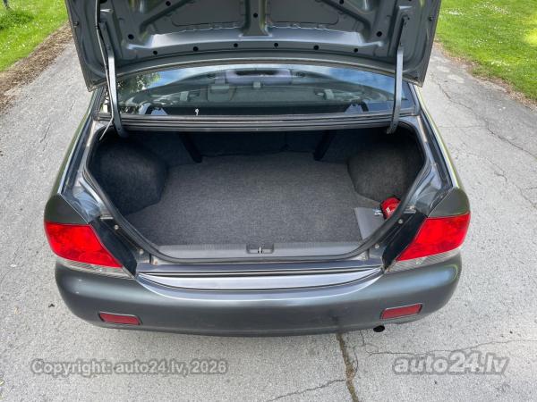 Grey Mitsubishi Lancer 2005 in Saue, with an engine capacity of 1.60 L and mileage of 119 thousand km for 2250 €, photo 9 on AUTOMOTO.COM.LV