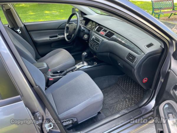 Grey Mitsubishi Lancer 2005 in Saue, with an engine capacity of 1.60 L and mileage of 119 thousand km for 2250 €, photo 10 on AUTOMOTO.COM.LV