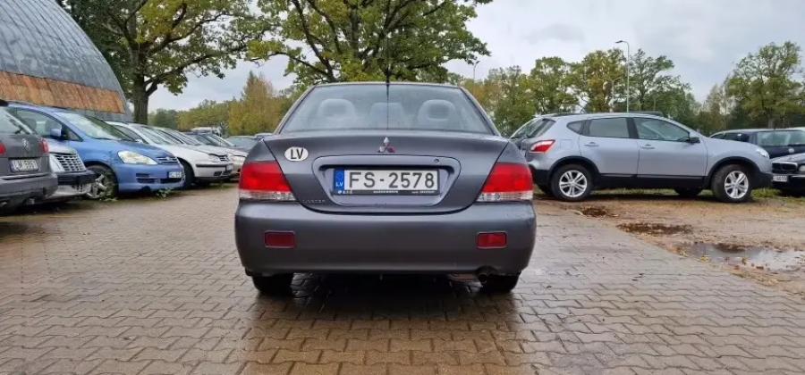Grey Mitsubishi Lancer 2005 in Valmiera, with an engine capacity of 1.60 L and mileage of 316 thousand km for 1400 €, photo 5 on AUTOMOTO.COM.LV
