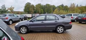 Grey Mitsubishi Lancer 2005 in Valmiera, with an engine capacity of 1.60 L and mileage of 316 thousand km for 1400 €, photo 7 on AUTOMOTO.COM.LV