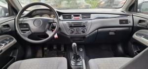 Grey Mitsubishi Lancer 2005 in Valmiera, with an engine capacity of 1.60 L and mileage of 316 thousand km for 1400 €, photo 10 on AUTOMOTO.COM.LV