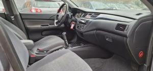 Grey Mitsubishi Lancer 2005 in Valmiera, with an engine capacity of 1.60 L and mileage of 316 thousand km for 1400 €, photo 12 on AUTOMOTO.COM.LV