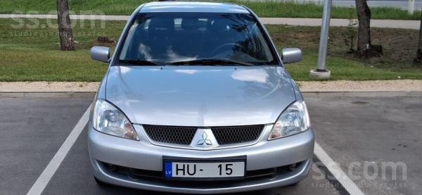 Pelēks Mitsubishi Lancer 2005 Rīga, ar dzinēja tilpumu 1.60 L un nobraukumu 180 tūkst. km par 1400 €, foto 1 vietnē AUTOMOTO.COM.LV