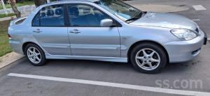 Pelēks Mitsubishi Lancer 2005 Rīga, ar dzinēja tilpumu 1.60 L un nobraukumu 180 tūkst. km par 1400 €, foto 3 vietnē AUTOMOTO.COM.LV