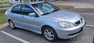 Pelēks Mitsubishi Lancer 2005 Rīga, ar dzinēja tilpumu 1.60 L un nobraukumu 180 tūkst. km par 1400 €, foto 5 vietnē AUTOMOTO.COM.LV