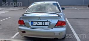 Pelēks Mitsubishi Lancer 2005 Rīga, ar dzinēja tilpumu 1.60 L un nobraukumu 180 tūkst. km par 1400 €, foto 6 vietnē AUTOMOTO.COM.LV