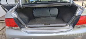 Pelēks Mitsubishi Lancer 2005 Rīga, ar dzinēja tilpumu 1.60 L un nobraukumu 180 tūkst. km par 1400 €, foto 10 vietnē AUTOMOTO.COM.LV