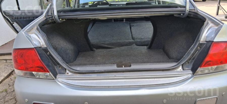 Pelēks Mitsubishi Lancer 2005 Rīga, ar dzinēja tilpumu 1.60 L un nobraukumu 180 tūkst. km par 1400 €, foto 10 vietnē AUTOMOTO.COM.LV
