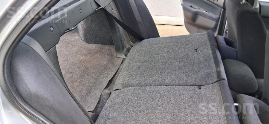 Pelēks Mitsubishi Lancer 2005 Rīga, ar dzinēja tilpumu 1.60 L un nobraukumu 180 tūkst. km par 1400 €, foto 12 vietnē AUTOMOTO.COM.LV