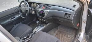 Pelēks Mitsubishi Lancer 2005 Rīga, ar dzinēja tilpumu 1.60 L un nobraukumu 180 tūkst. km par 1400 €, foto 16 vietnē AUTOMOTO.COM.LV