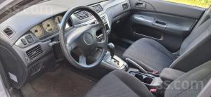 Pelēks Mitsubishi Lancer 2005 Rīga, ar dzinēja tilpumu 1.60 L un nobraukumu 180 tūkst. km par 1400 €, foto 17 vietnē AUTOMOTO.COM.LV