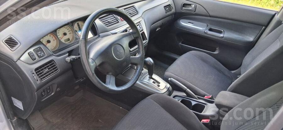 Pelēks Mitsubishi Lancer 2005 Rīga, ar dzinēja tilpumu 1.60 L un nobraukumu 180 tūkst. km par 1400 €, foto 17 vietnē AUTOMOTO.COM.LV