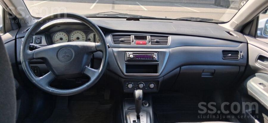 Pelēks Mitsubishi Lancer 2005 Rīga, ar dzinēja tilpumu 1.60 L un nobraukumu 180 tūkst. km par 1400 €, foto 18 vietnē AUTOMOTO.COM.LV