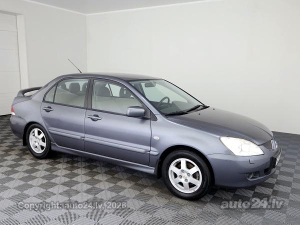 Pelēks Mitsubishi Lancer 2005 Tallina, ar dzinēja tilpumu 1.60 L un nobraukumu 119 tūkst. km par 1699 €, foto 1 vietnē AUTOMOTO.COM.LV