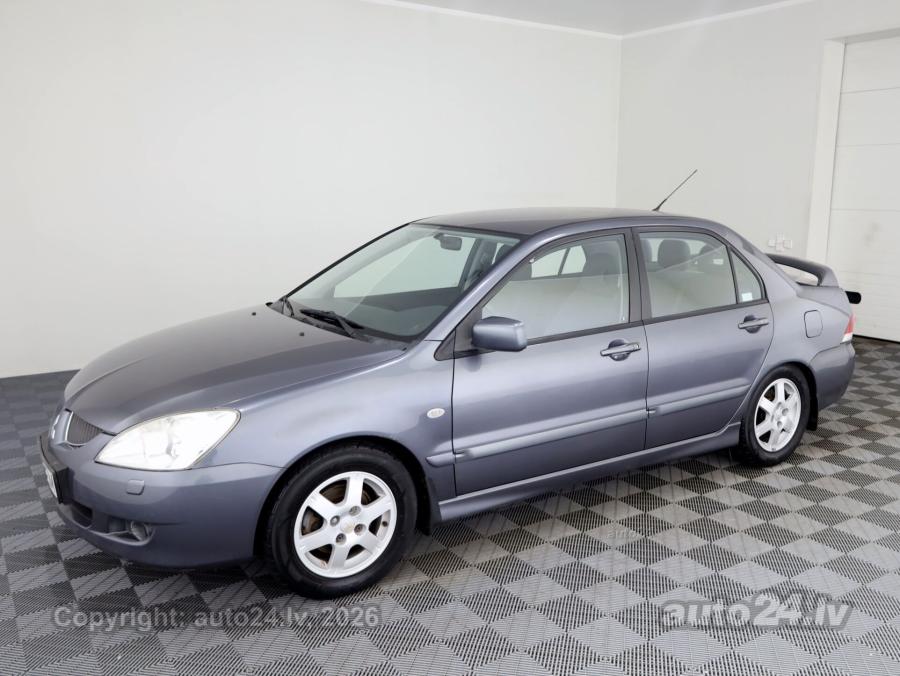 Pelēks Mitsubishi Lancer 2005 Tallina, ar dzinēja tilpumu 1.60 L un nobraukumu 119 tūkst. km par 1699 €, foto 3 vietnē AUTOMOTO.COM.LV