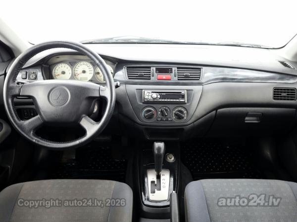 Pelēks Mitsubishi Lancer 2005 Tallina, ar dzinēja tilpumu 1.60 L un nobraukumu 119 tūkst. km par 1699 €, foto 5 vietnē AUTOMOTO.COM.LV