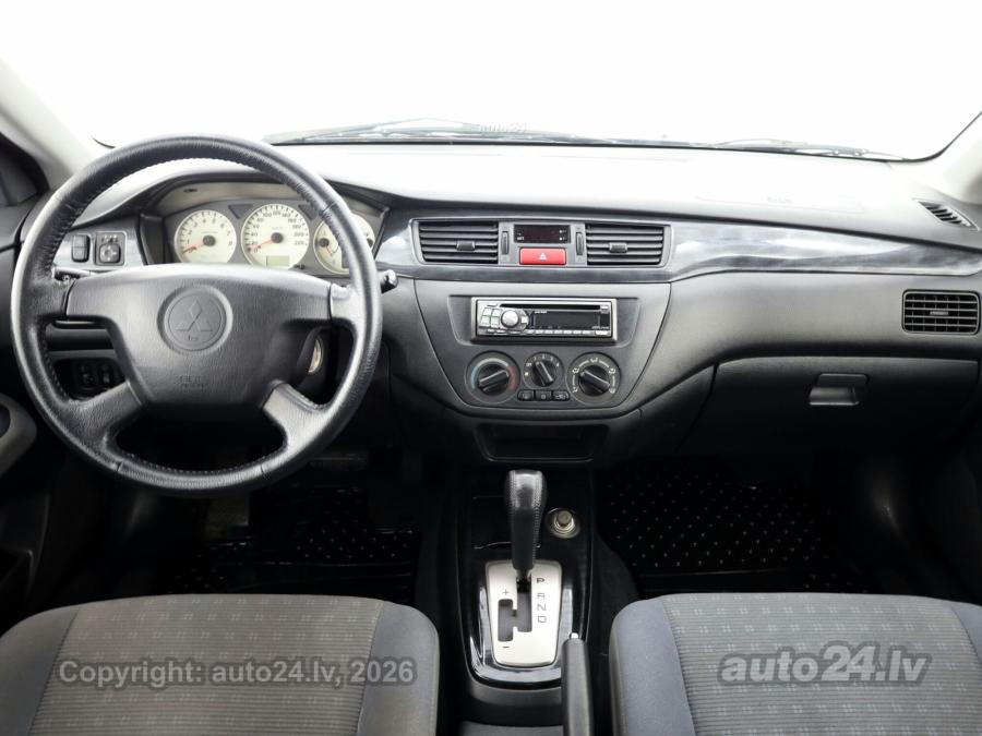 Pelēks Mitsubishi Lancer 2005 Tallina, ar dzinēja tilpumu 1.60 L un nobraukumu 119 tūkst. km par 1699 €, foto 6 vietnē AUTOMOTO.COM.LV
