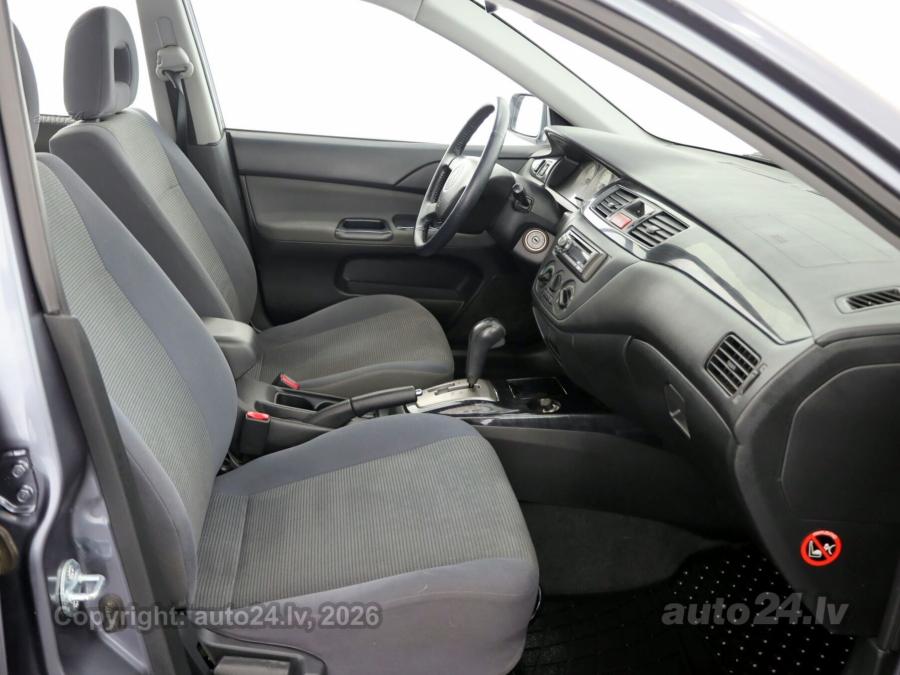 Pelēks Mitsubishi Lancer 2005 Tallina, ar dzinēja tilpumu 1.60 L un nobraukumu 119 tūkst. km par 1699 €, foto 7 vietnē AUTOMOTO.COM.LV