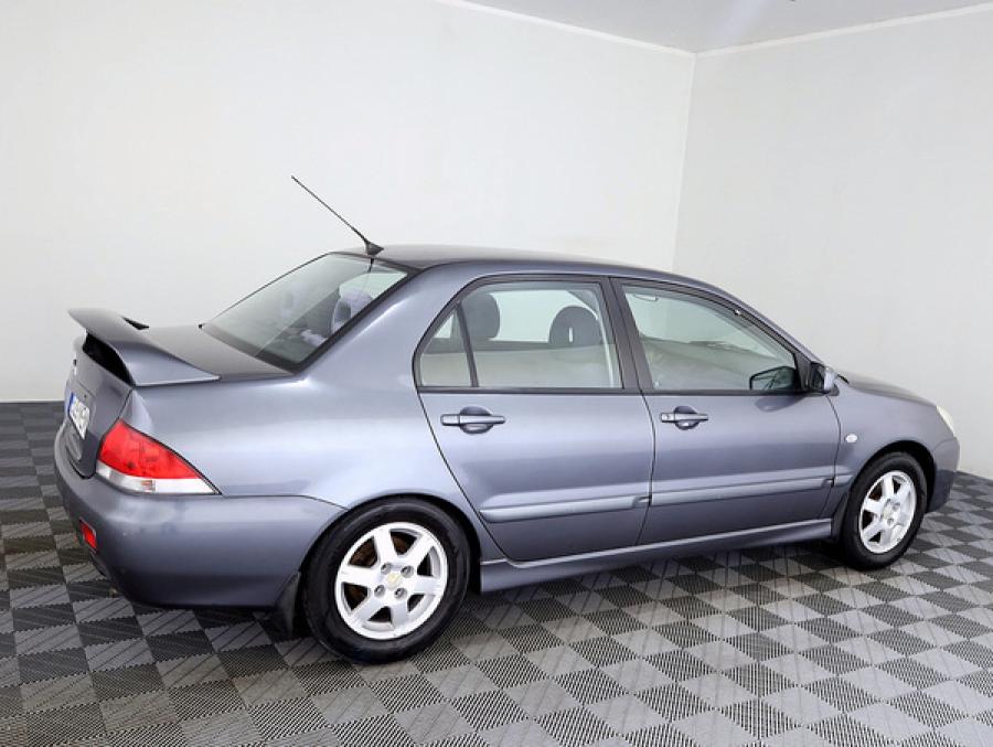 Grey Mitsubishi Lancer 2005 in Tallinn, with an engine capacity of 1.60 L and mileage of 119 thousand km for 1699 €, photo 4 on AUTOMOTO.COM.LV