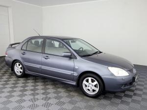 Grey Mitsubishi Lancer 2005 in Tallinn, with an engine capacity of 1.60 L and mileage of 119 thousand km for 1699 €, photo 8 on AUTOMOTO.COM.LV