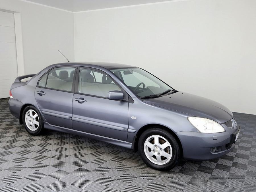 Grey Mitsubishi Lancer 2005 in Tallinn, with an engine capacity of 1.60 L and mileage of 119 thousand km for 1699 €, photo 8 on AUTOMOTO.COM.LV