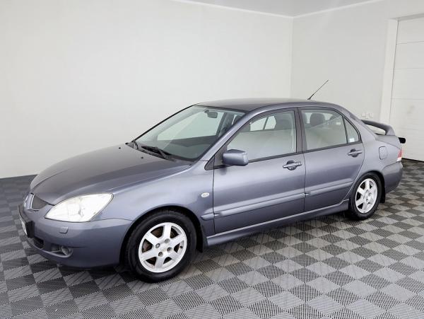 Grey Mitsubishi Lancer 2005 in Tallinn, with an engine capacity of 1.60 L and mileage of 119 thousand km for 1699 €, photo 8 on AUTOMOTO.COM.LV