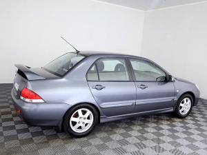 Grey Mitsubishi Lancer 2005 in Tallinn, with an engine capacity of 1.60 L and mileage of 119 thousand km for 1699 €, photo 10 on AUTOMOTO.COM.LV