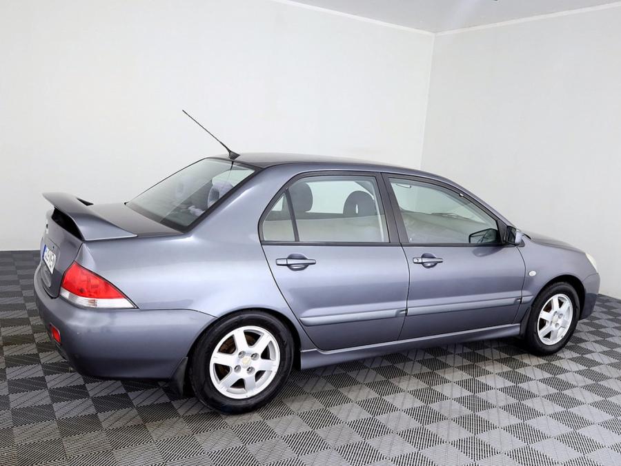 Grey Mitsubishi Lancer 2005 in Tallinn, with an engine capacity of 1.60 L and mileage of 119 thousand km for 1699 €, photo 10 on AUTOMOTO.COM.LV