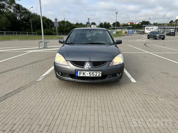 Pelēks Mitsubishi Lancer 2005 Rēzekne, ar dzinēja tilpumu 1.60 L un nobraukumu 258 tūkst. km par 800 €, foto 1 vietnē AUTOMOTO.COM.LV