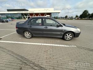 Pelēks Mitsubishi Lancer 2005 Rēzekne, ar dzinēja tilpumu 1.60 L un nobraukumu 258 tūkst. km par 800 €, foto 3 vietnē AUTOMOTO.COM.LV