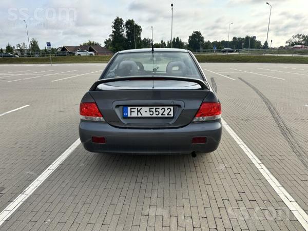 Pelēks Mitsubishi Lancer 2005 Rēzekne, ar dzinēja tilpumu 1.60 L un nobraukumu 258 tūkst. km par 800 €, foto 4 vietnē AUTOMOTO.COM.LV