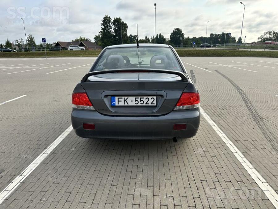 Pelēks Mitsubishi Lancer 2005 Rēzekne, ar dzinēja tilpumu 1.60 L un nobraukumu 258 tūkst. km par 800 €, foto 5 vietnē AUTOMOTO.COM.LV