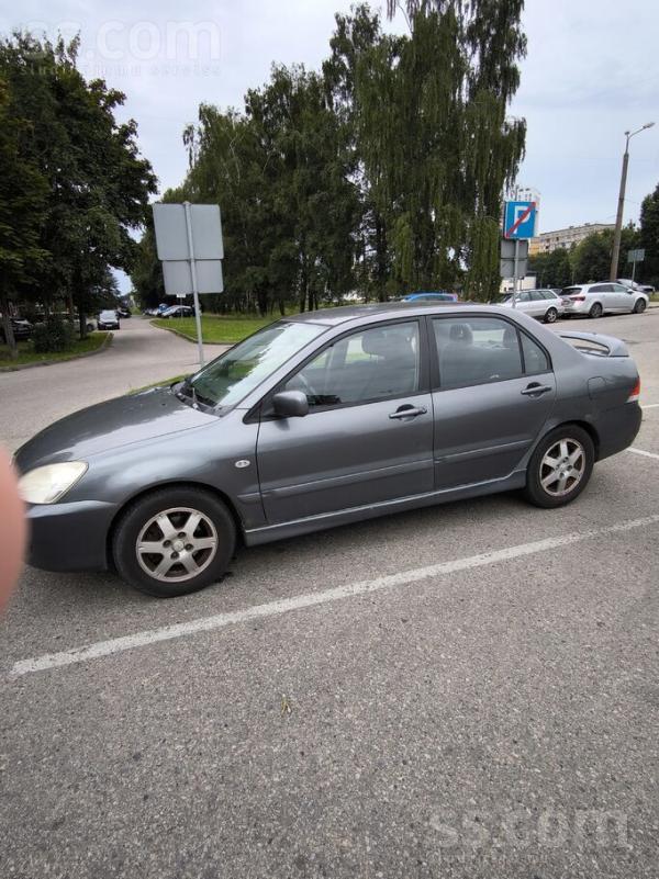 Grey Mitsubishi Lancer 2006 in Riga, with an engine capacity of 1.60 L and mileage of 160 thousand km for 700 €, photo 1 on AUTOMOTO.COM.LV