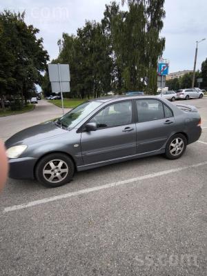 Grey Mitsubishi Lancer 2006 in Riga, with an engine capacity of 1.60 L and mileage of 160 thousand km for 700 €, photo  on AUTOMOTO.COM.LV