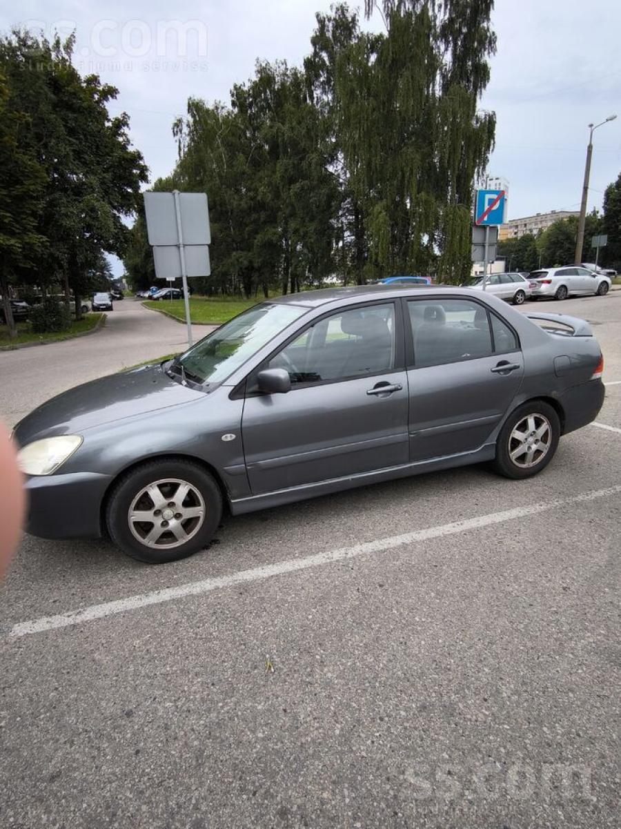 Grey Mitsubishi Lancer 2006 in Riga, with an engine capacity of 1.60 L and mileage of 160 thousand km for 700 €, photo 1 on AUTOMOTO.COM.LV