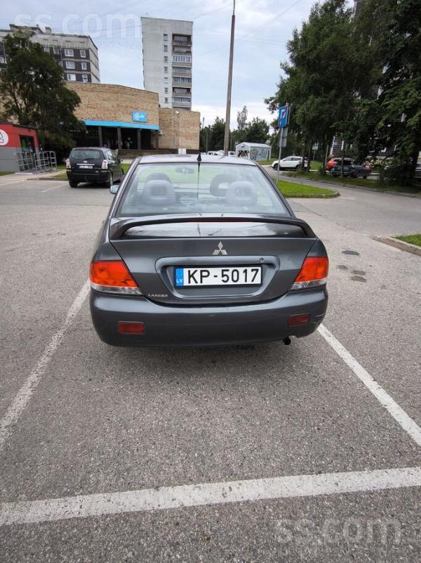 Grey Mitsubishi Lancer 2006 in Riga, with an engine capacity of 1.60 L and mileage of 160 thousand km for 700 €, photo 3 on AUTOMOTO.COM.LV
