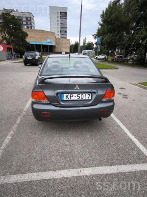 Grey Mitsubishi Lancer 2006 in Riga, with an engine capacity of 1.60 L and mileage of 160 thousand km for 700 €, photo 4 on AUTOMOTO.COM.LV
